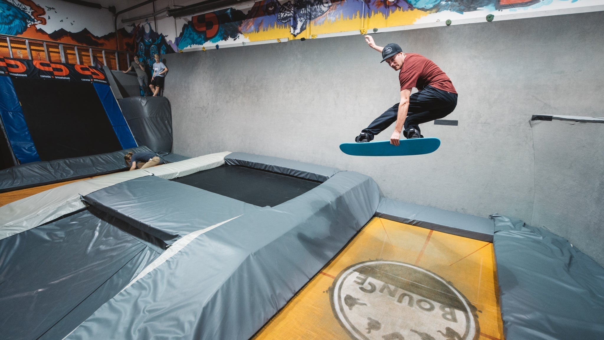 How To Backside 360 On A Tramp Board – Snowboard Addiction